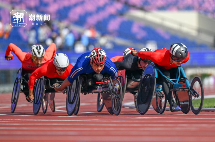 亚残运田径赛首日：轮椅竞速 风驰电掣